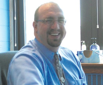 Star of Queens: Michael Germano, director of campus ministry ...