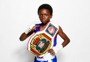 A 10-year-old boxer from Springfield Gardens has taken the boxing world ...