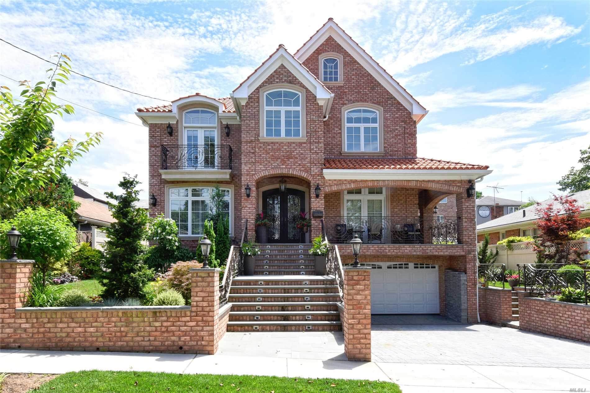 SEE IT: Custom-built Whitestone home with a wine cellar hits the market ...