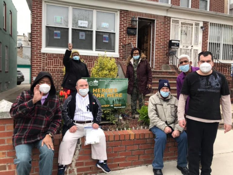 Queens Centers for Progress celebrates staff with parade of cars past ...