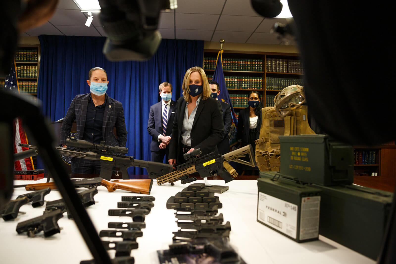 Four arrested, dozens of weapons seized in ghost gun raids in Bayside ...