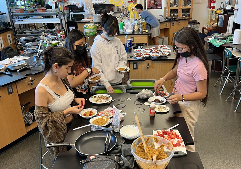 Maspeth High School students cook up $500 to donate to minority and ...