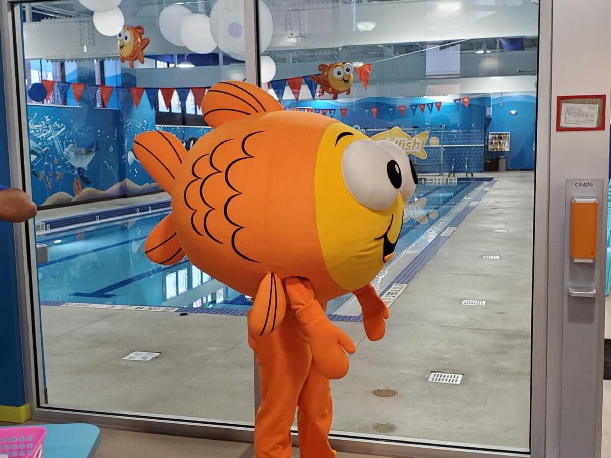 Officials celebrate opening of Goldfish Swim School at the Shops at ...
