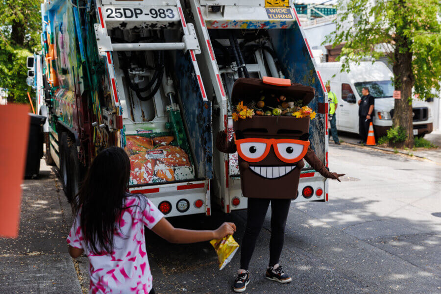 ‘Our way of giving back’: NYPD’s 102nd Precinct hosts block party in ...