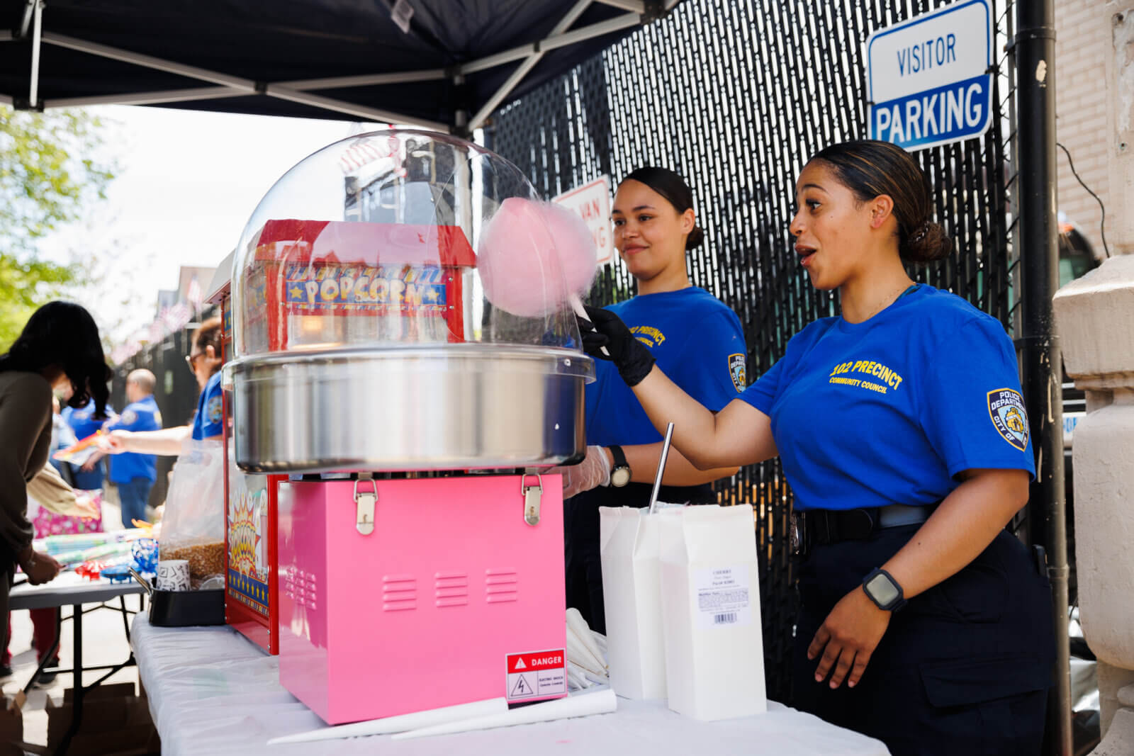‘Our way of giving back’: NYPD’s 102nd Precinct hosts block party in ...