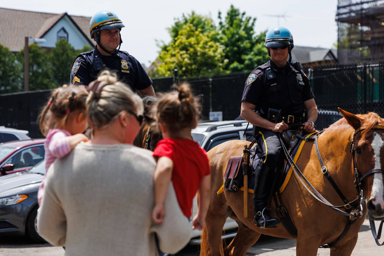 ‘Our way of giving back’: NYPD’s 102nd Precinct hosts block party in ...