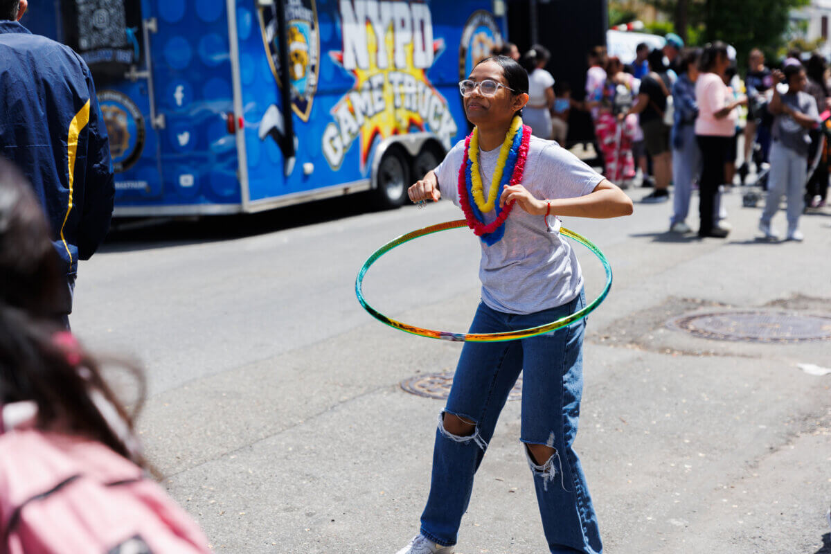 ‘Our way of giving back’: NYPD’s 102nd Precinct hosts block party in ...