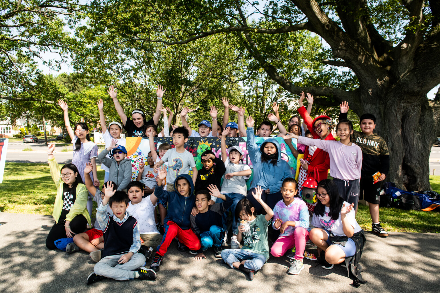 Queens students celebrate social action artwork installation at ...