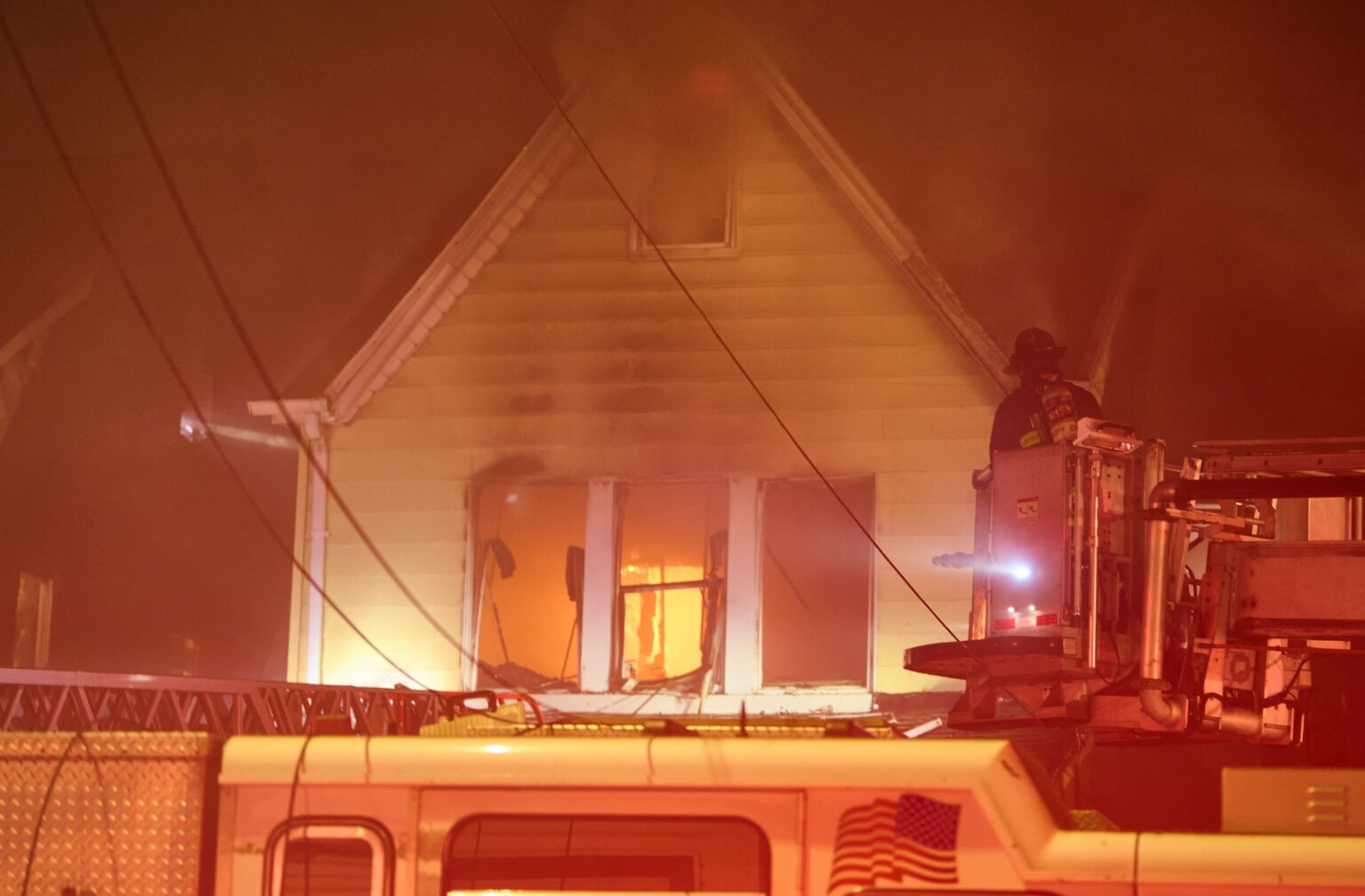Two-alarm fire engulfs Springfield Gardens home, damages neighboring ...