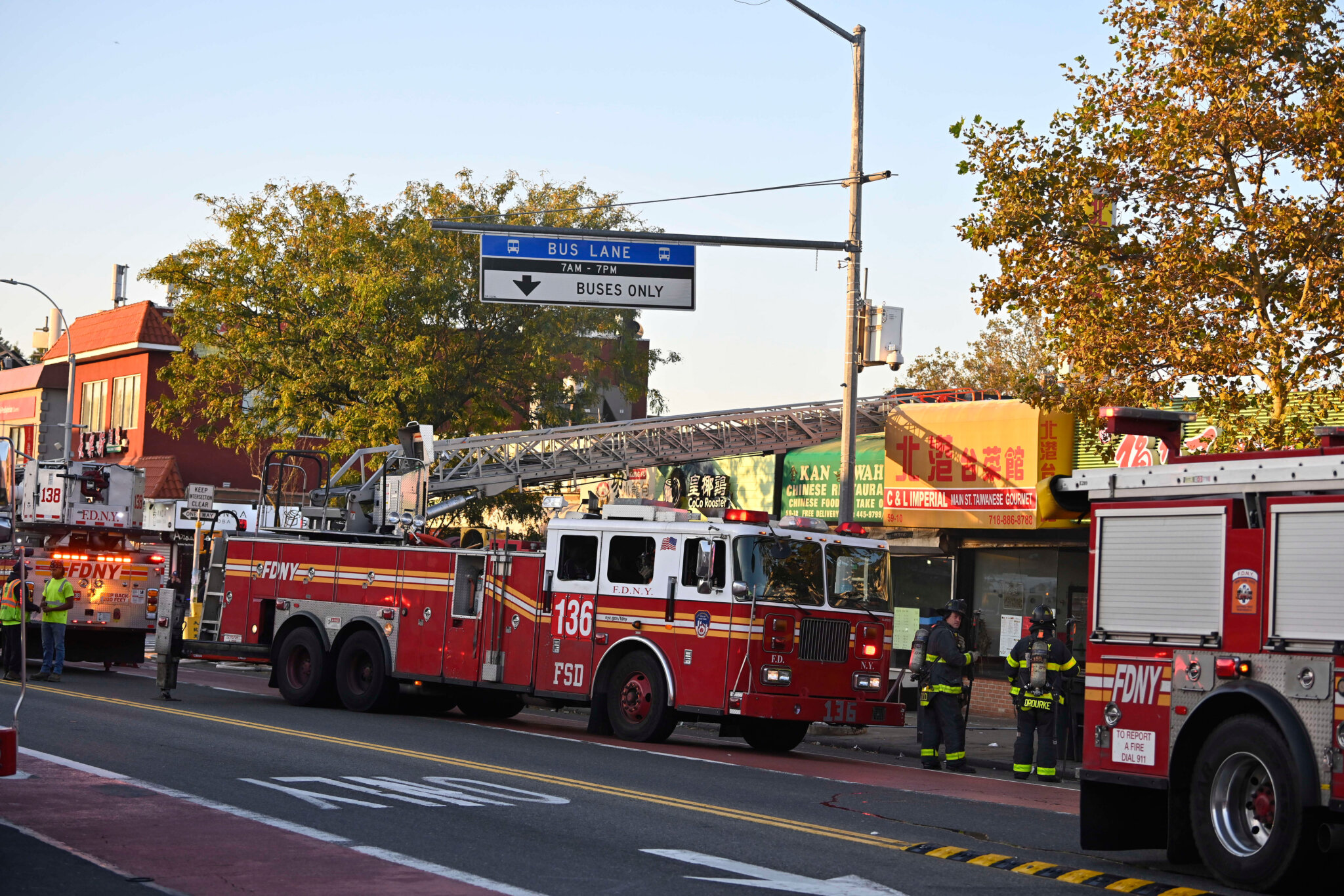FDNY fights 2-alarm blaze on a commercial strip on Main Street in ...