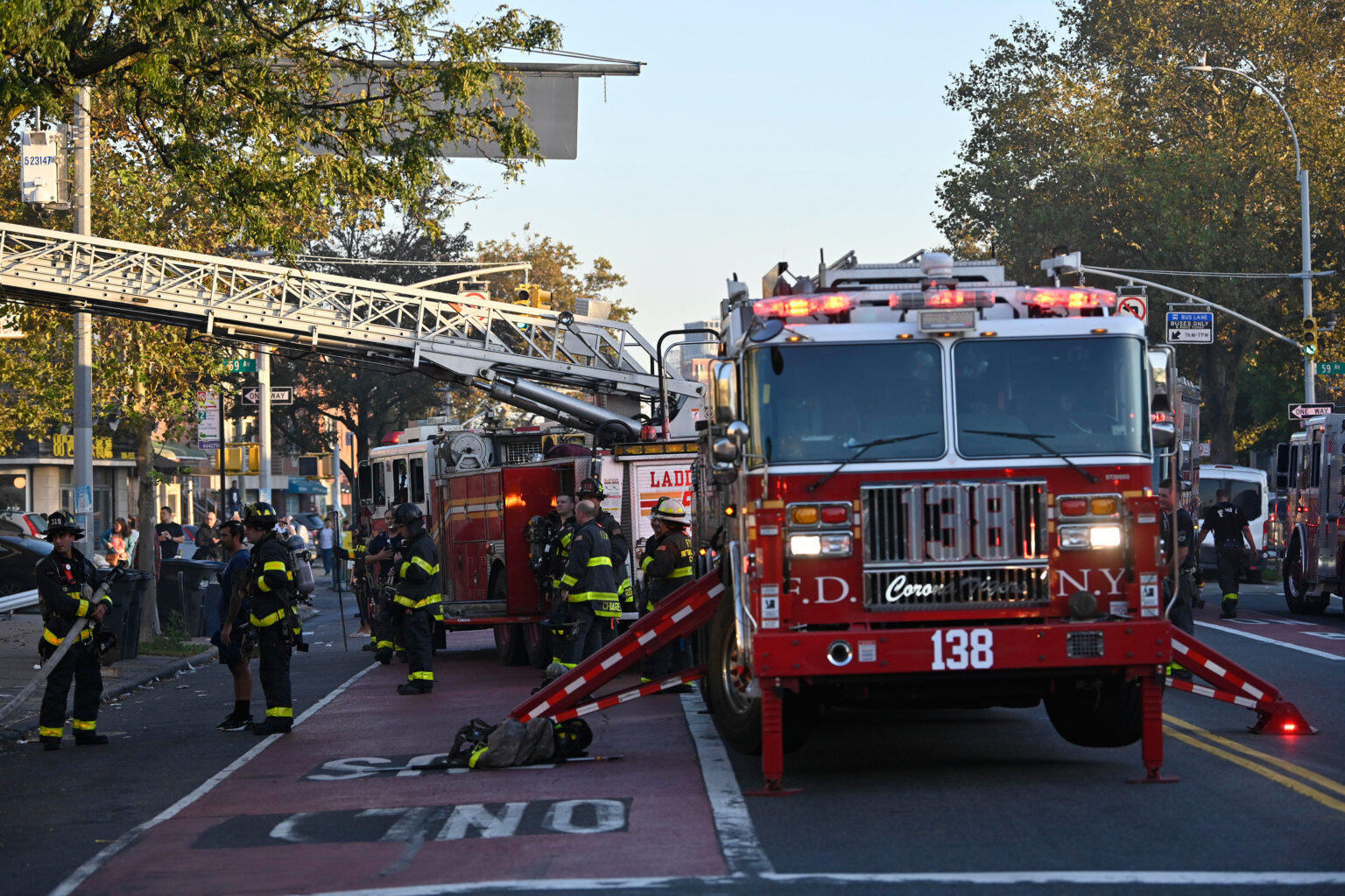 FDNY fights 2-alarm blaze on a commercial strip on Main Street in ...