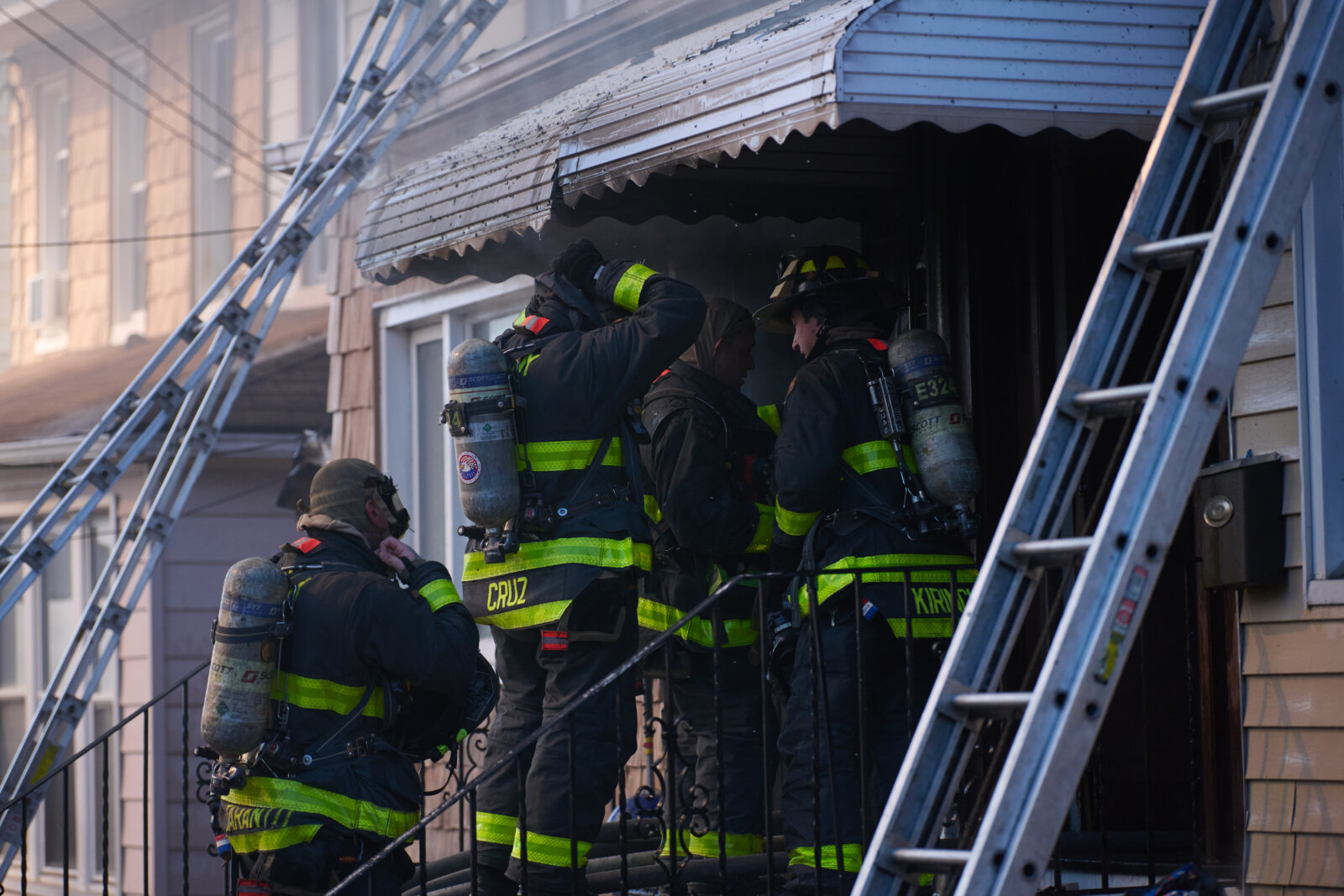 Mother, two children hurt, firefighters injured battling three-alarm ...