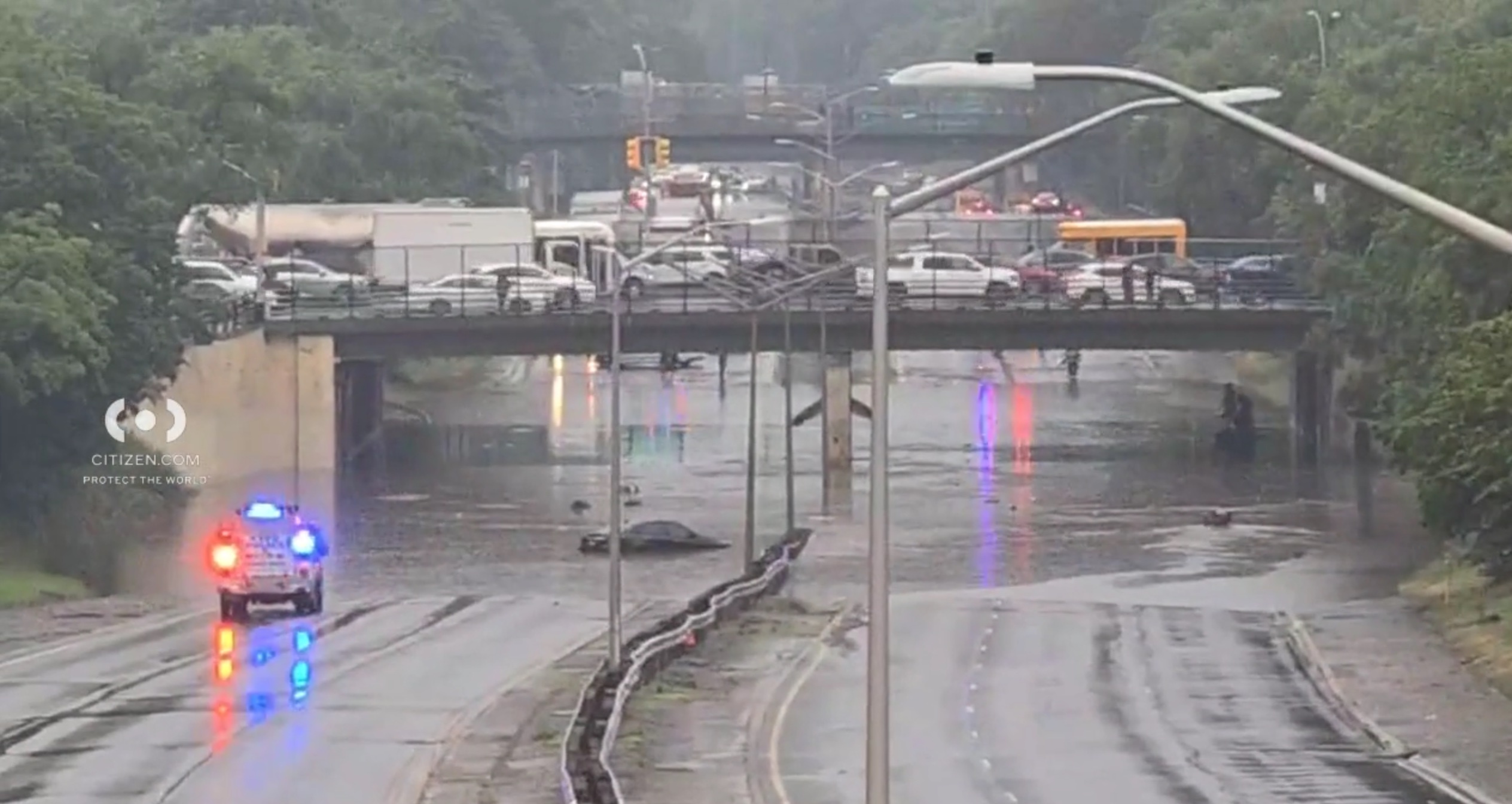 FDNY, NYPD rescue drivers from flooding on Clearview Expressway in ...